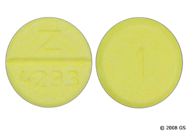 small round yellow tablets